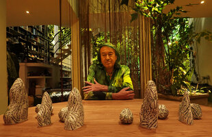 Patrick Blanc at home, checking his plant designs on the island rocks ...